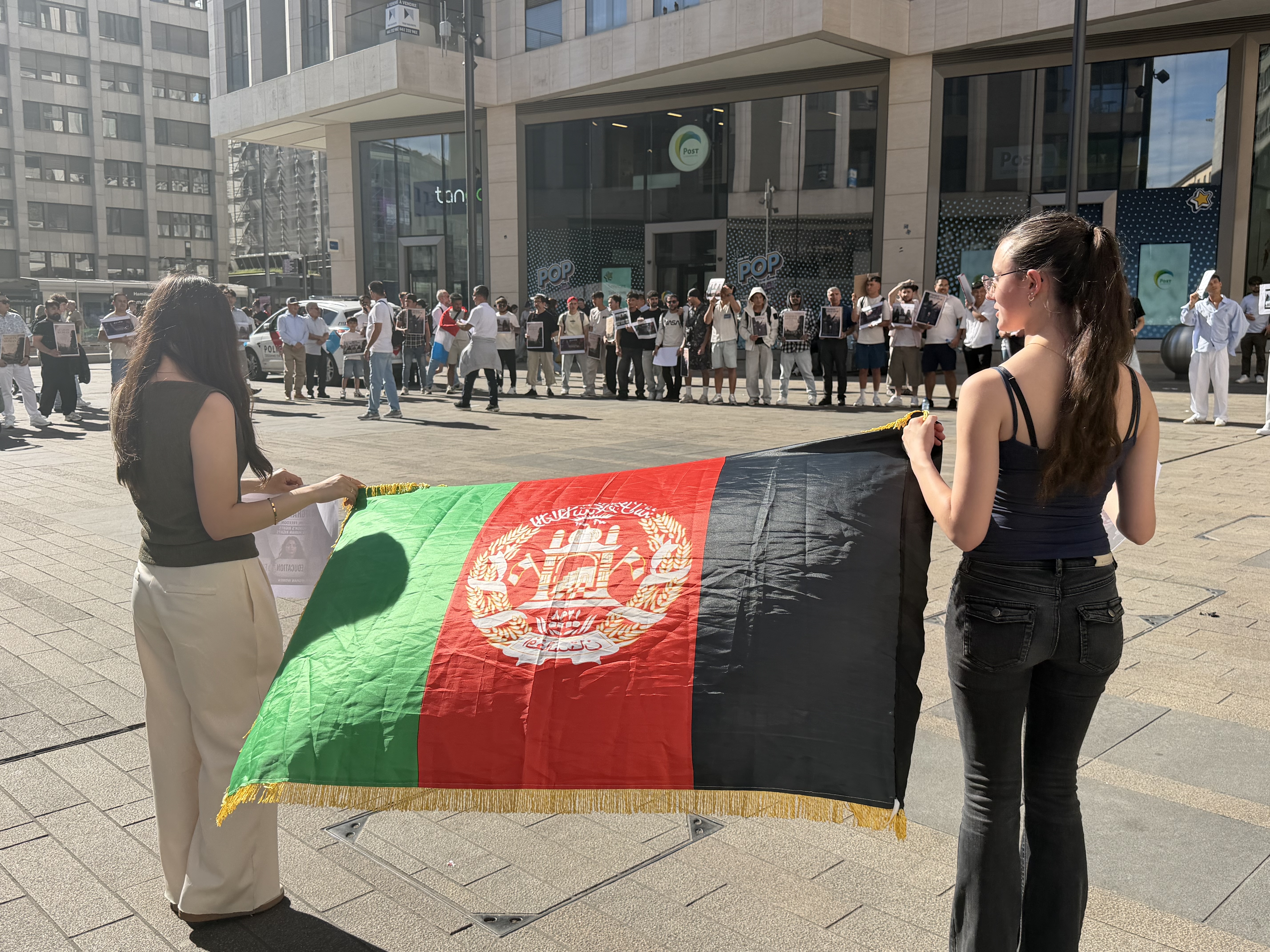'Work, education, and freedom': Around 100 gather at Hamilius in ...