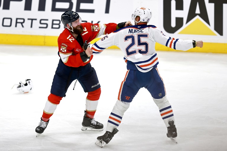 Ice hockey rivals: Panthers maul Oilers in stormy clash to lead Stanley ...