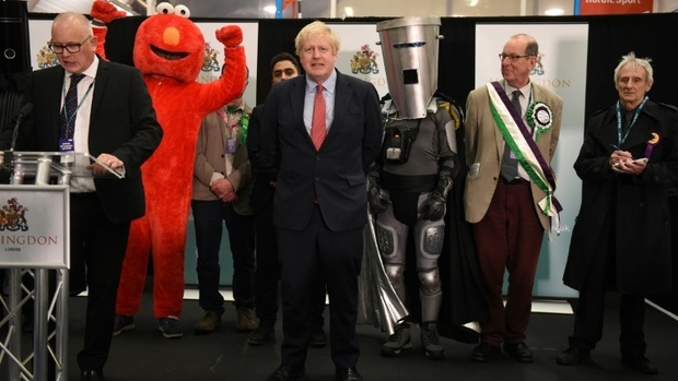 Best election pic?: Johnson won UK seat flanked by Elmo, Lord ...