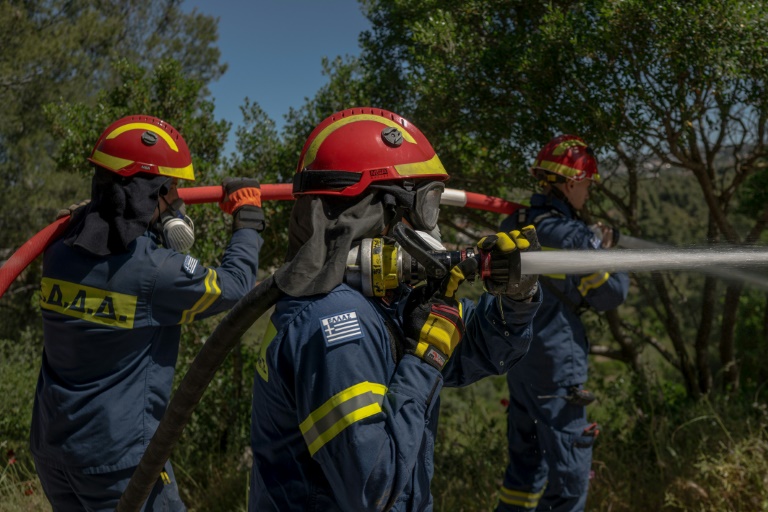 Closing days of spring: Blaze-hit Athens suburb trains to tackle new ...