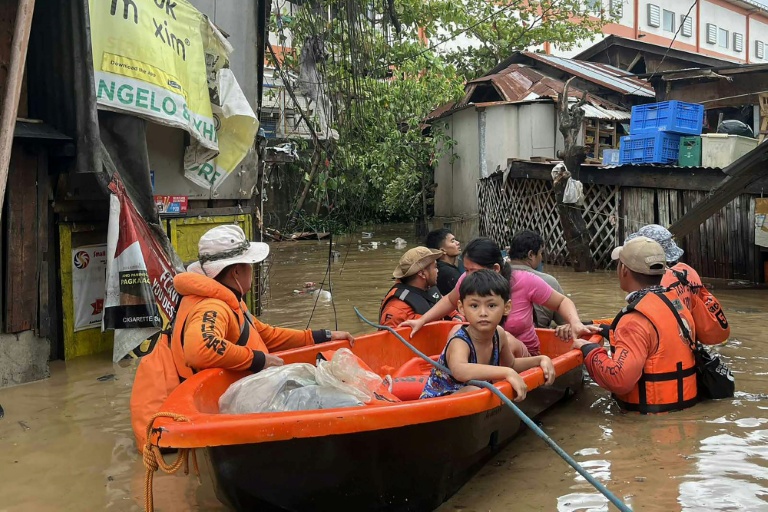 Towns inundated: Typhoon flooding kills 5, strands thousands in central ...