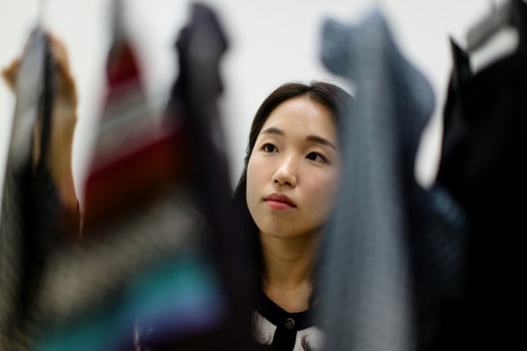 Awakening: No new clothes: S. Korean climate activist targets ...